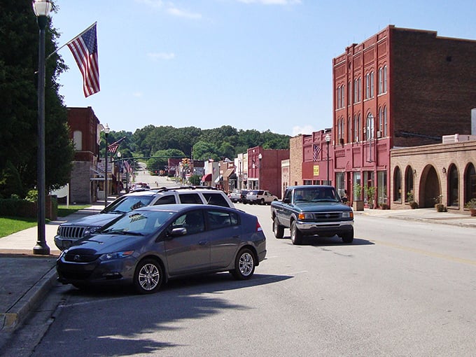 Downtown Rockwood feels like stepping into a Norman Rockwell painting where American flags wave and brick buildings tell stories of simpler times.