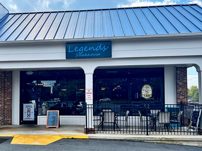 The blue neon sign of Legends Steakhouse glows like a carnivorous lighthouse, beckoning hungry travelers to this unassuming strip mall treasure in Newberry.