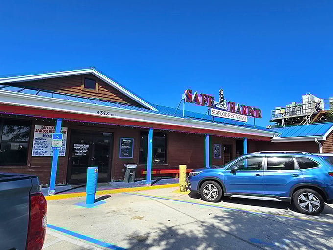 The iconic red and blue sign welcomes hungry seafood lovers like a lighthouse guiding ships to shore. No pretension, just the promise of fresh catches ahead.