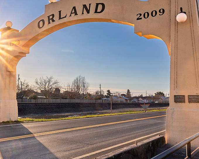 Downtown Orland's vintage storefronts tell stories of simpler times, where Orland Cleaners stands alongside the promise of Chinese cuisine – small-town charm personified. 