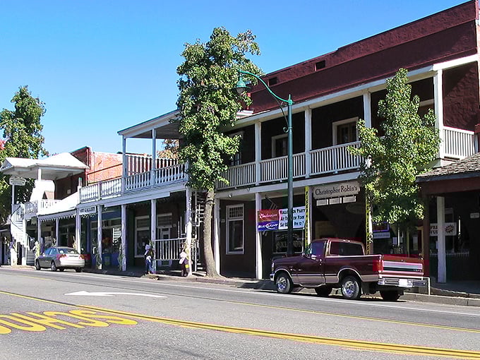 Main Street Weaverville stretches toward the mountains like a postcard from a simpler time, when traffic jams meant three cars at the stop sign.