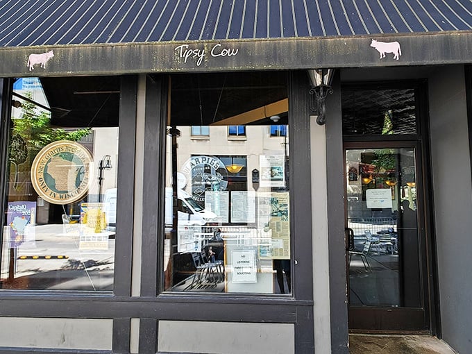 The unassuming storefront of Tipsy Cow beckons with its simple charm. Those cow silhouettes aren't just cute decoration—they're a promise of dairy-forward delights inside.