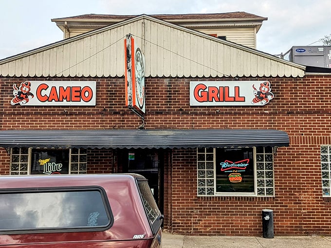 The brick facade and vintage signage of Cameo Grill stands as a beacon of burger perfection in Massillon, where culinary legends are born without pretense.
