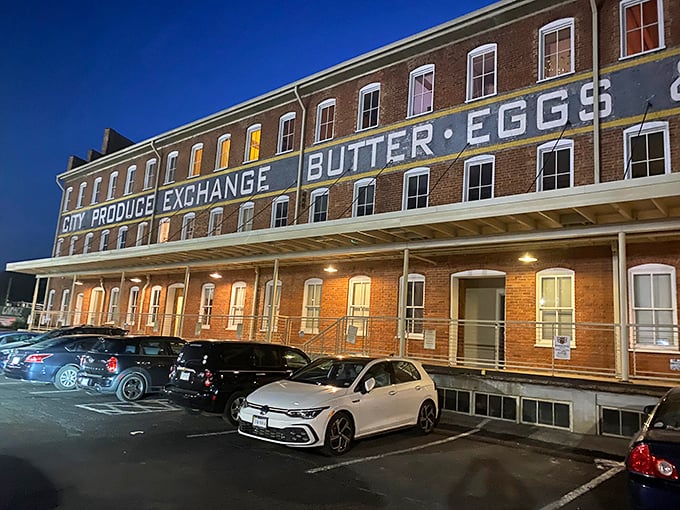 As night falls, the old produce exchange reveals its new identity—a temple to carnivorous delights where history and hunger happily collide.
