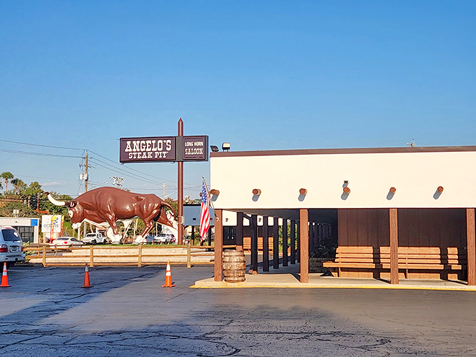The iconic red bull statue stands guard outside Angelo's Steak Pit, a Panama City Beach landmark that's been beckoning hungry visitors since the 1950s.