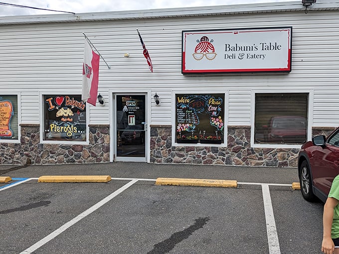 Polish and American flags flutter outside this stone-foundation eatery, where "I ❤️ Polish Pierogis" isn't just window dressing—it's a life philosophy.