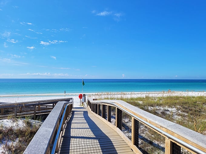 Where wooden pathways meet emerald waters—this isn't a Caribbean postcard, it's just another Tuesday in Destin, Florida.