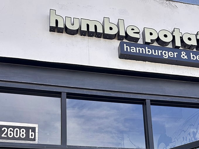 That sign says it all – "humble potato" with "hamburger & be-" – leaving you to discover the "be amazing" part yourself.
