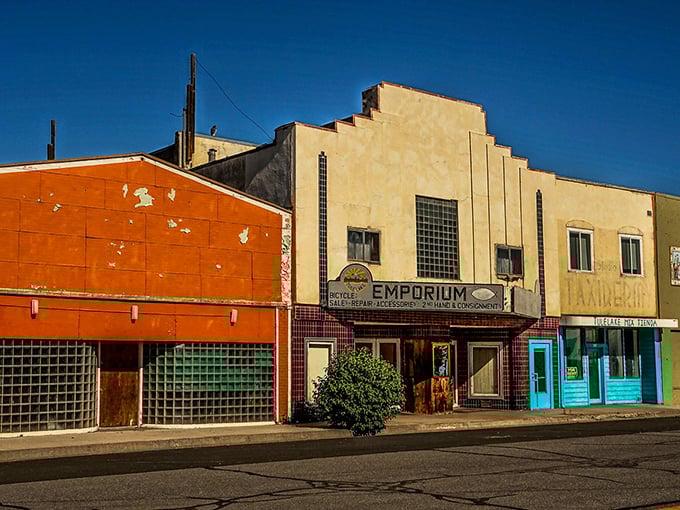 Main Street's colorful storefronts tell a story of small-town resilience, where your dollar stretches further than your average yoga enthusiast.