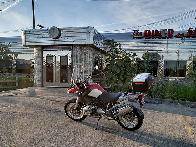 The gleaming stainless steel exterior of The Diner on 55th stands like a time capsule under the Cleveland sky, beckoning hungry travelers with its classic Americana charm. 