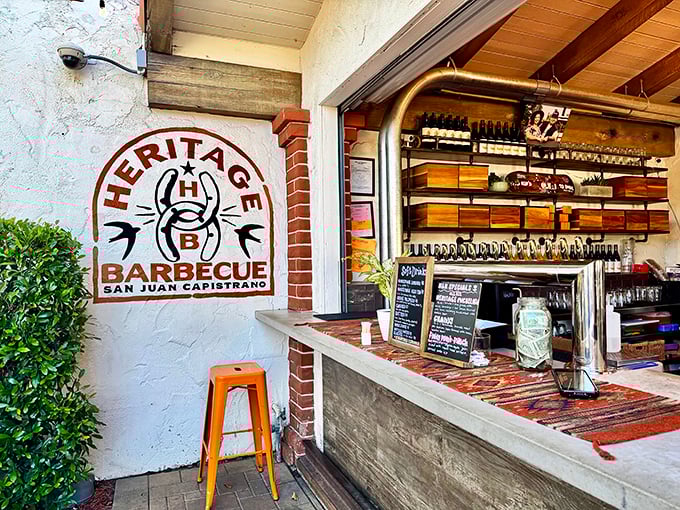 The Spanish-style facade of Heritage Barbecue welcomes hungry pilgrims with the promise of smoky salvation. That line? Consider it the appetizer to your meat feast.