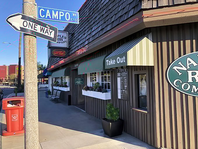 The unassuming exterior of Naples Rib Company hides culinary treasures within, like a BBQ speakeasy that forgot to keep the secret.