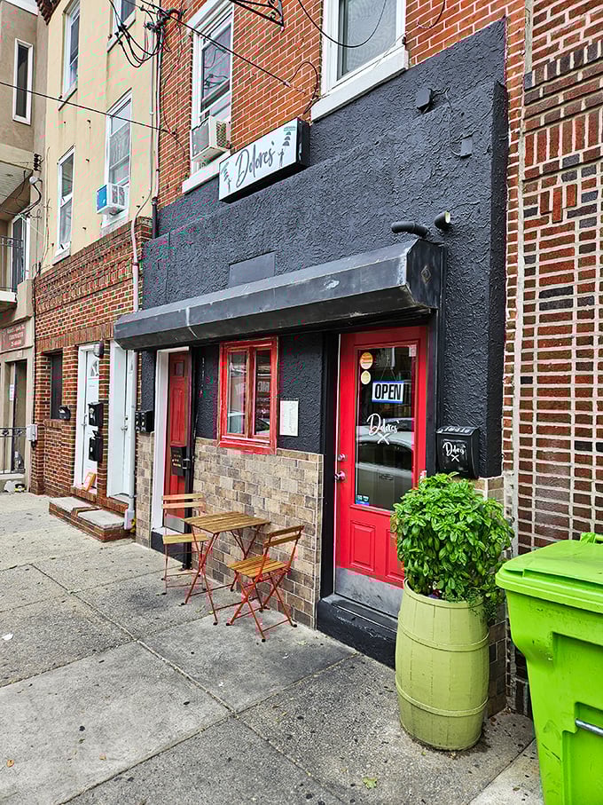 A classic Philadelphia storefront with character to spare – that pop of red against the black facade is like a culinary stop sign saying "You'd be crazy to pass this up."