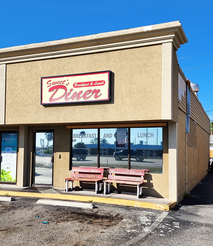 The classic red and white signage promises what every good diner should deliver: comfort, nostalgia, and food worth getting out of bed for.