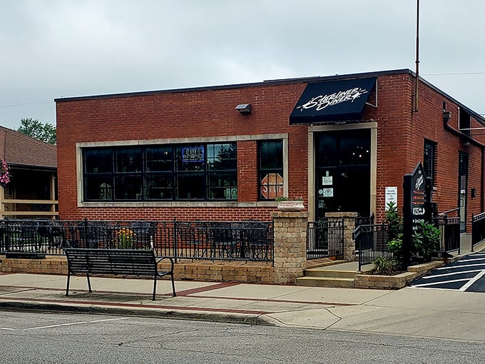 The unassuming brick exterior of Starliner Diner stands like a culinary TARDIS—modest outside, but containing infinite flavor possibilities within.