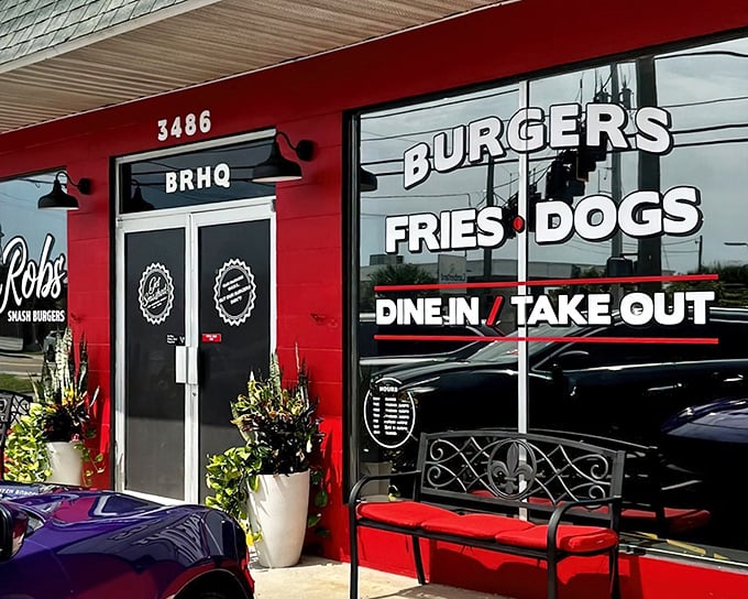 The bright red exterior of BurgerRobs stands out like a culinary lighthouse, beckoning hungry travelers with promises of smash burger perfection.