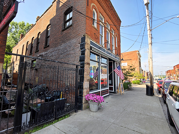 Harbor Halcyon's historic brick façade stands proudly on Ashtabula's Bridge Street, where an American flag waves welcome to hungry visitors seeking culinary refuge.