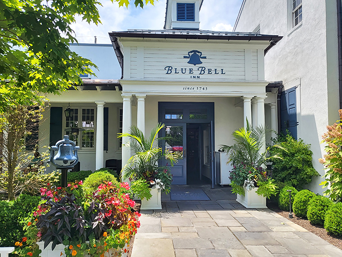 The unassuming white exterior of Blue Bell Inn hides culinary treasures within—like finding a Rolex in your grandmother's cookie jar.