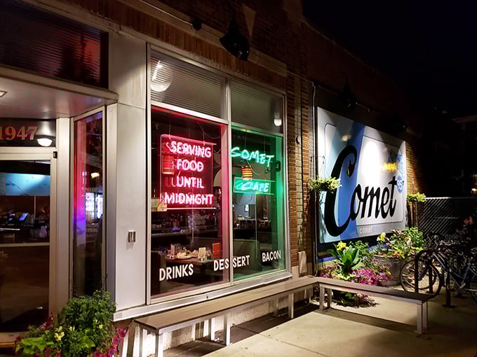 By night, Comet Café transforms into a beacon of comfort food possibilities. The neon signs practically whisper, "Yes, we have bacon" to passersby.