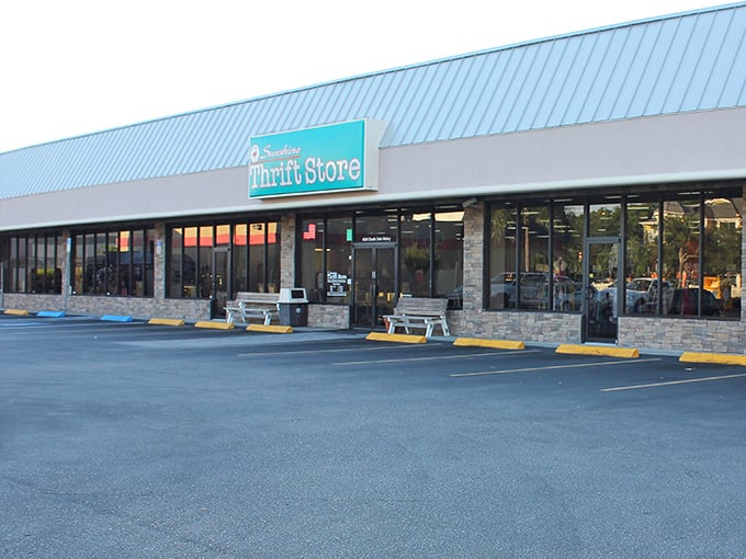 The turquoise glow of Sunshine Thrift's sign against the twilight sky – a beacon of bargain possibilities that makes even luxury shoppers weak in the knees.