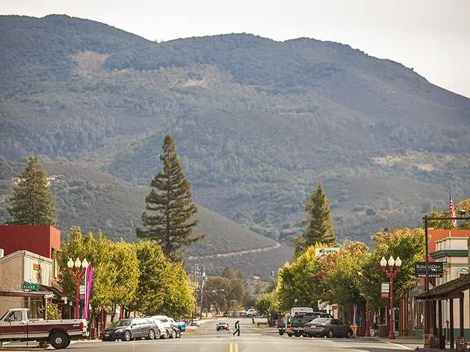 Main Street Kelseyville sits like a postcard come to life, with mountains standing guard over colorful storefronts that haven't surrendered to chain-store conformity.