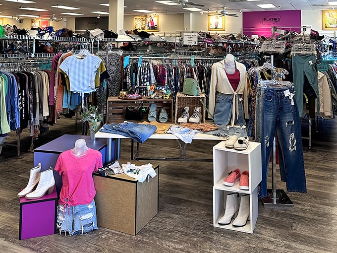 Not your grandmother's thrift store! Meticulously organized racks stretch into the distance, offering everything from casual tees to designer denim—all arranged for maximum treasure-hunting efficiency with minimal wallet damage.