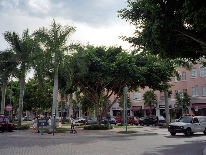 Mizner Park's pastel facades and outdoor cafés create a Mediterranean fantasy where your wallet can actually survive the experience.