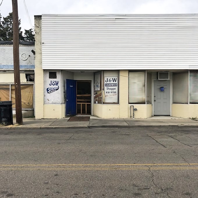The unassuming blue door of J&W Sandwich Shoppe beckons like a secret handshake. No fancy frills, just sandwich perfection waiting inside this Norwood treasure.