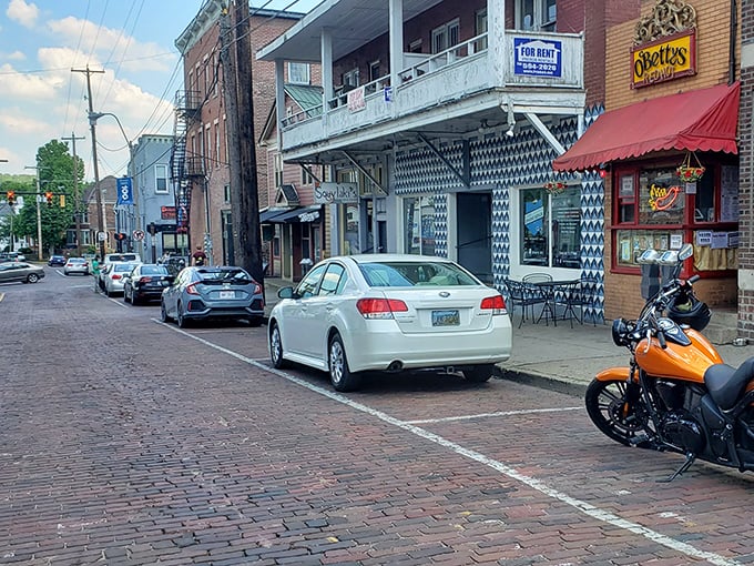 O'Betty's iconic red awning beckons from Athens' charming brick street, where culinary adventures await behind that unassuming storefront.