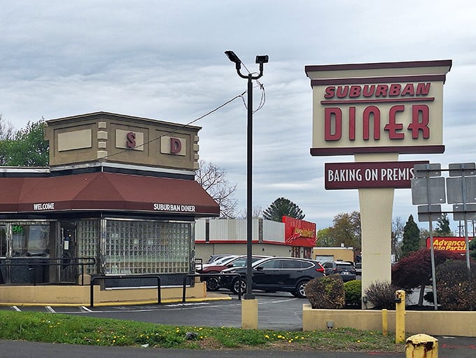 That iconic red signage promising "BAKING ON PREMIS" isn't just advertising – it's a sacred vow to carb enthusiasts everywhere.