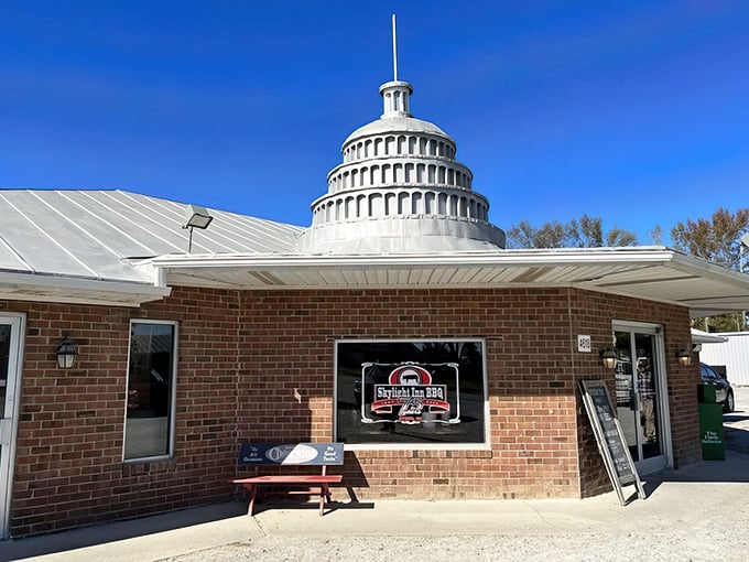 The Capitol dome crowning Skylight Inn isn't just architectural whimsy—it's a declaration of barbecue sovereignty that says "the pork stops here."