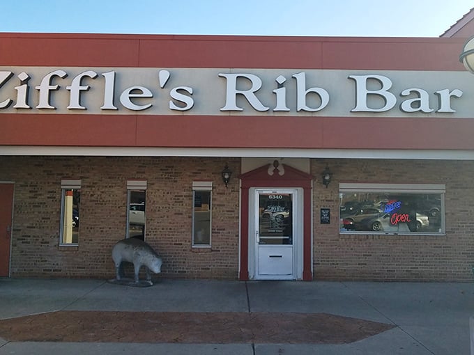 The unassuming brick exterior of Ziffle's Rib Bar proves once again that the best BBQ joints don't waste energy on fancy facades—they're too busy smoking meat to perfection.