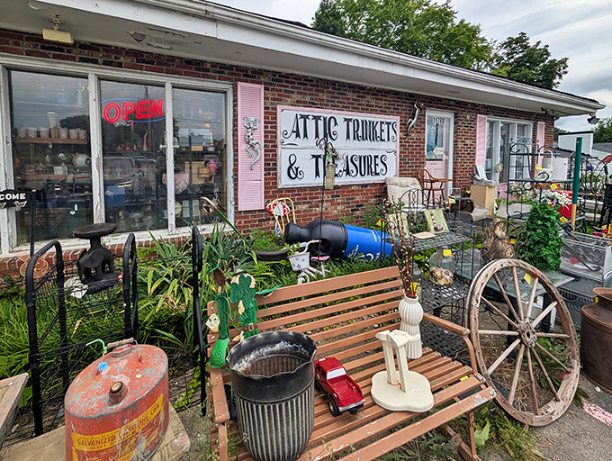 The unassuming brick exterior of Attic Trinkets & Treasures is like a treasure chest disguised as a mailbox—unremarkable until you peek inside.
