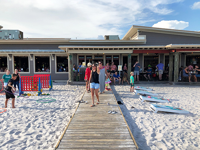 The ultimate beach dining fantasy comes to life: a wooden boardwalk leading straight from sugar-white sand to seafood paradise.