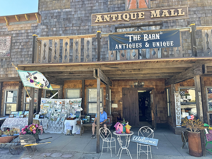 The weathered cedar shingles and rustic signage of The Barn aren't just Instagram-worthy—they're a time portal waiting to be opened.