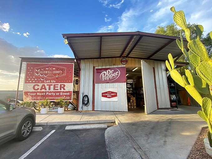 The corrugated metal exterior isn't just Texas-inspired architecture—it's a smoke signal to BBQ pilgrims that authentic Central Texas-style goodness awaits inside.