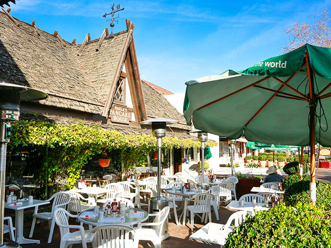 Danish architecture meets California sunshine at Paula's outdoor patio, where those distinctive pitched roofs and climbing vines create the perfect breakfast backdrop.