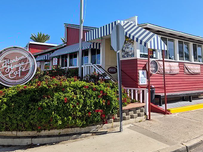 Harbor House's cheerful façade stands like a culinary lighthouse on PCH, beckoning hungry travelers with the promise of comfort food salvation.