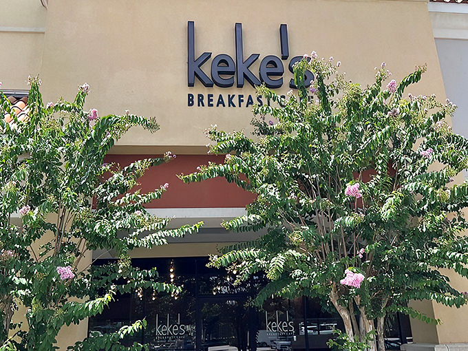 The unassuming exterior of KeKe's Café hides a breakfast paradise within. Like finding a treasure map where X marks the pancake spot.