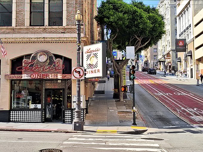 Lori's Diner stands proudly on a San Francisco corner, its vintage neon sign beckoning hungry travelers like a lighthouse for comfort food enthusiasts.