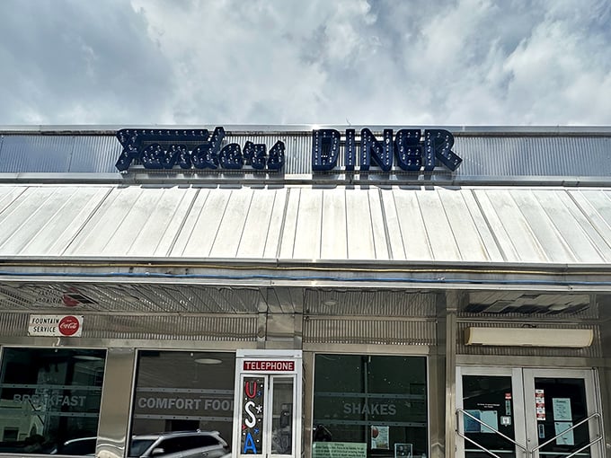 That classic silver exterior isn't trying to be vintage – it simply is, promising authentic diner magic inside.
