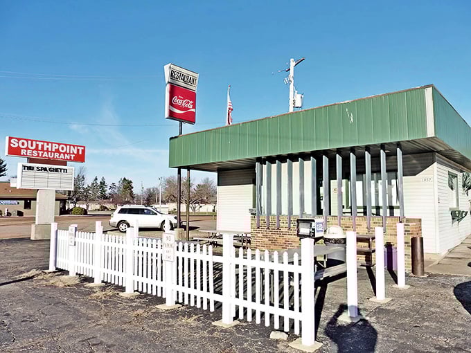 That iconic red sign promises what every Wisconsin road trip needs—a genuine diner experience where calories don't count.