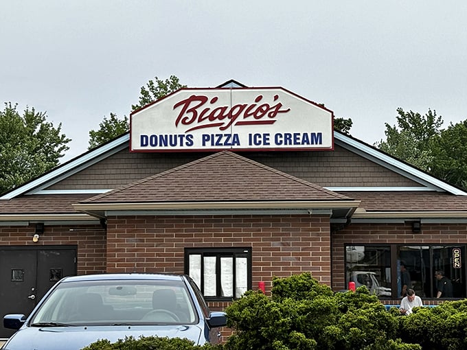 The sign says it all: donuts, pizza, ice cream. It's not a promise—it's a delicious threat to your willpower that you'll happily surrender to.