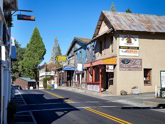 Main Street Groveland whispers Gold Rush tales while the Iron Door Saloon sign promises cold drinks and warm stories beneath Sierra skies.