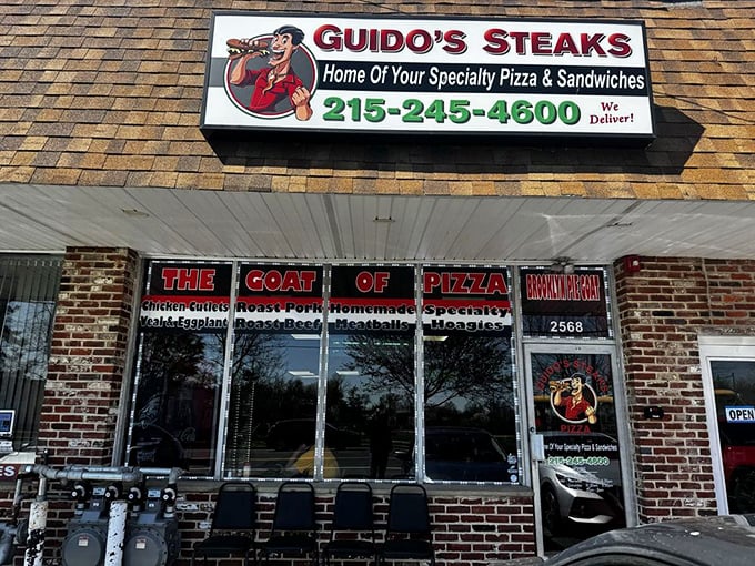 The unassuming brick exterior of Guido's Steaks & Pizza boldly proclaims itself "The GOAT of Pizza" – a claim your taste buds might just confirm.