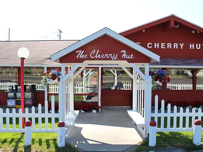 That entrance arbor isn't just an architectural detail—it's a portal to a world where cherry is king and diet plans go to die.
