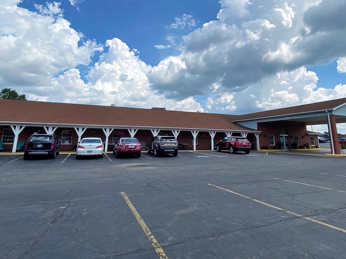 Where Amish tradition meets hungry travelers – this unassuming exterior houses culinary treasures that keep the parking lot full.