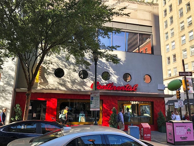 Those signature round windows and vibrant red exterior aren't just eye-catching—they're practically sending smoke signals to hungry Philadelphians.