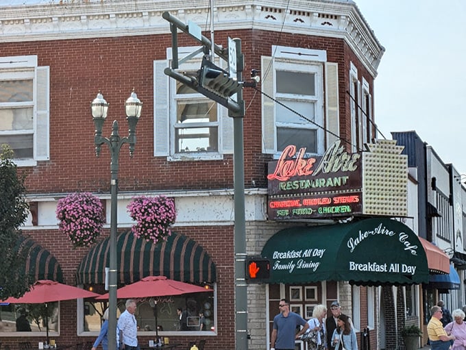 The corner brick building with its iconic green awnings and vibrant hanging flower baskets has been stopping Lake Geneva pedestrians in their tracks for generations.