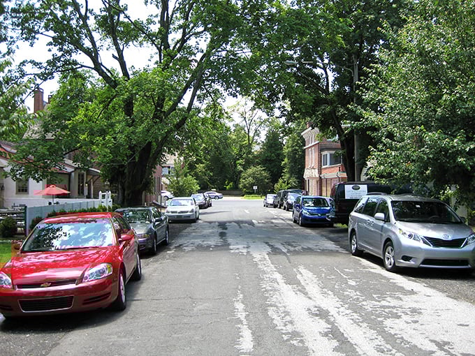 Tree-lined Main Street in Odessa offers a perfect snapshot of small-town charm, where historic homes stand sentinel over unhurried daily life.
